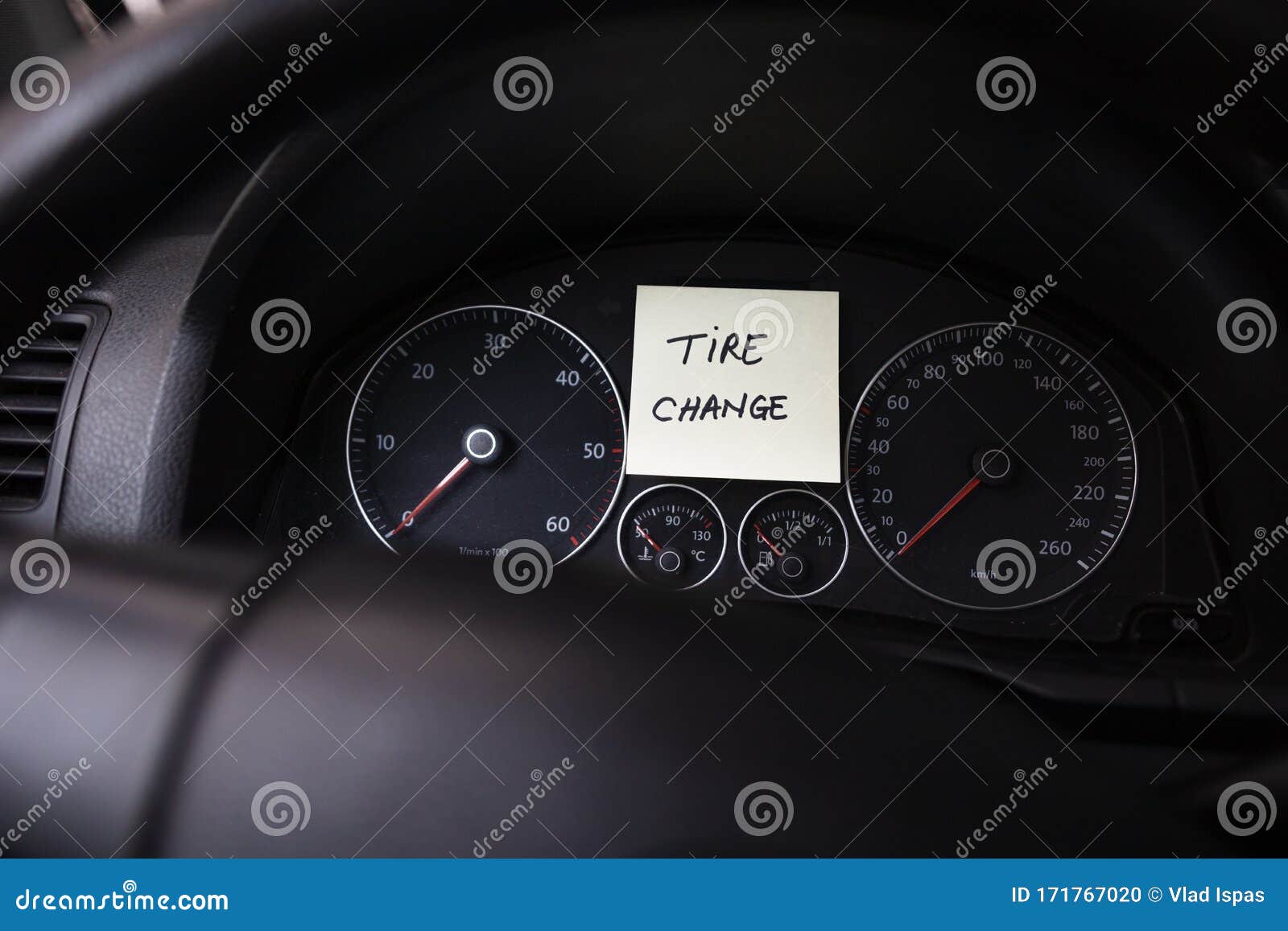 Writing Tire Change on Memo Post Reminder. Text on Sticky Paper Inside ...