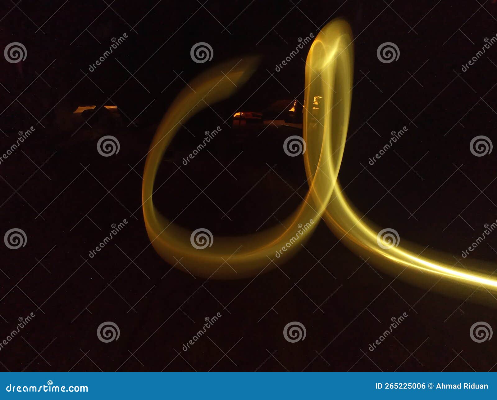 Writing a Using Light Painting Techniques, with Yellow Lights. Stock ...