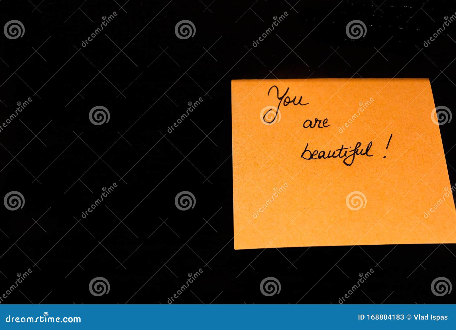 Writing You are Beautiful on Memo Post Reminder. Text on Sticky Paper ...