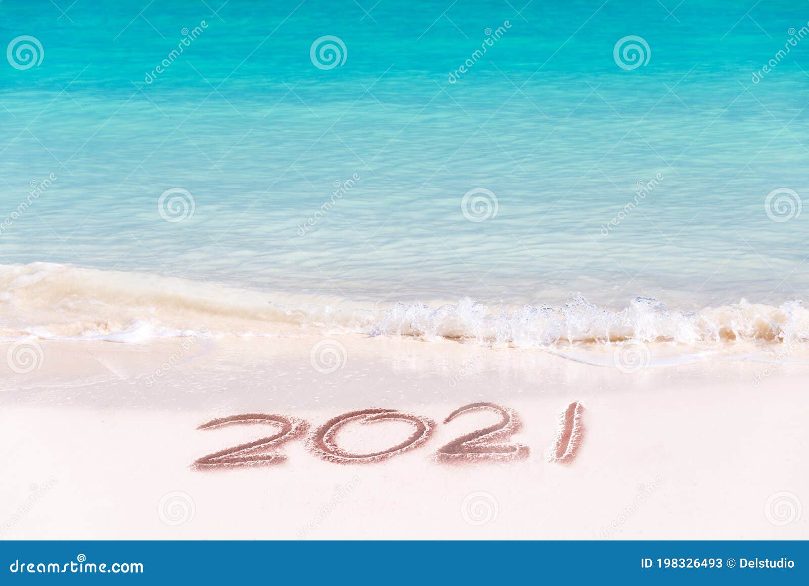 2021 Written on the Sand of a Beach Travel 2020 New Year Concept Stock ...