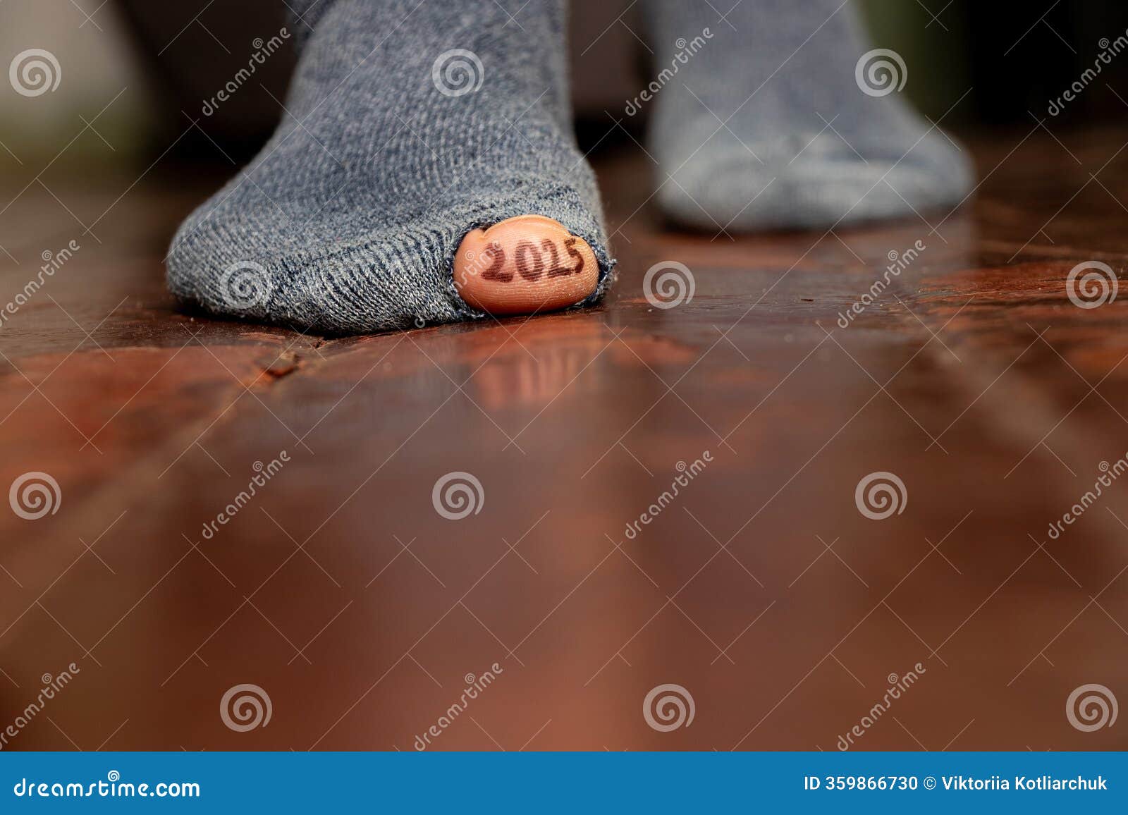 2025 Written on a Toe and the Toe Sticks Out of a Hole in a Torn Sock ...