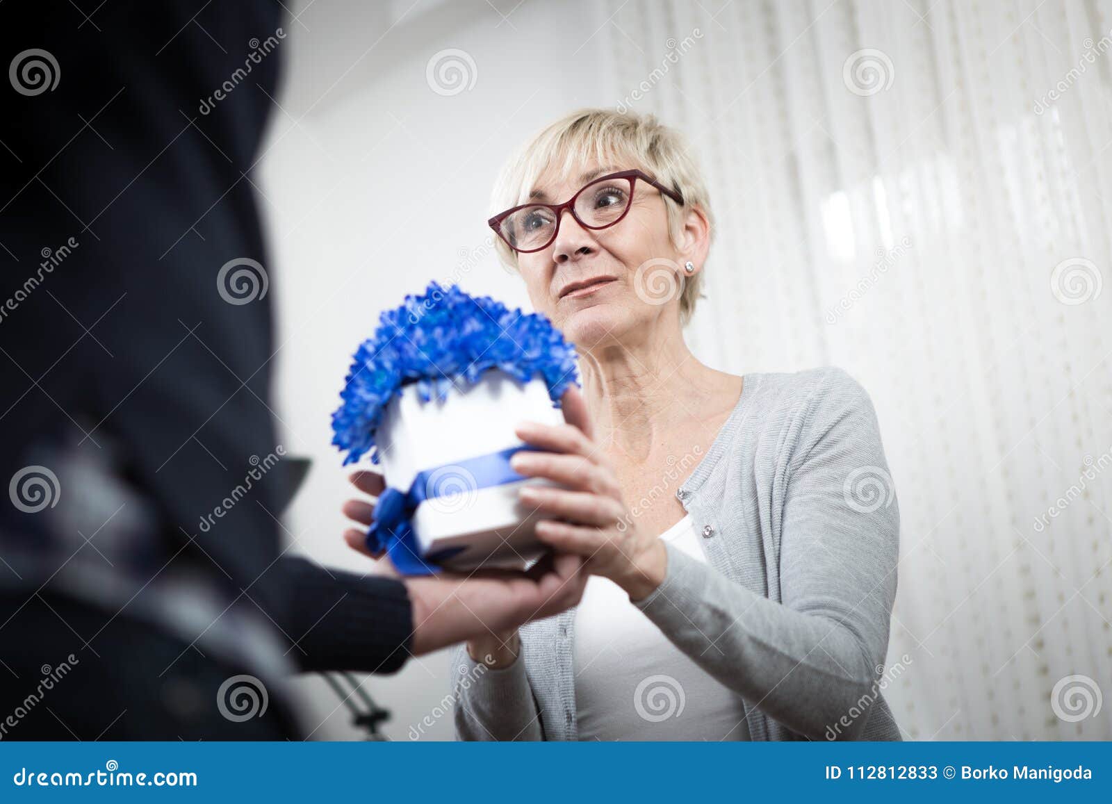 Wrong Gift at the Wrong Time. Stock Image - Image of away, aging: 112812833