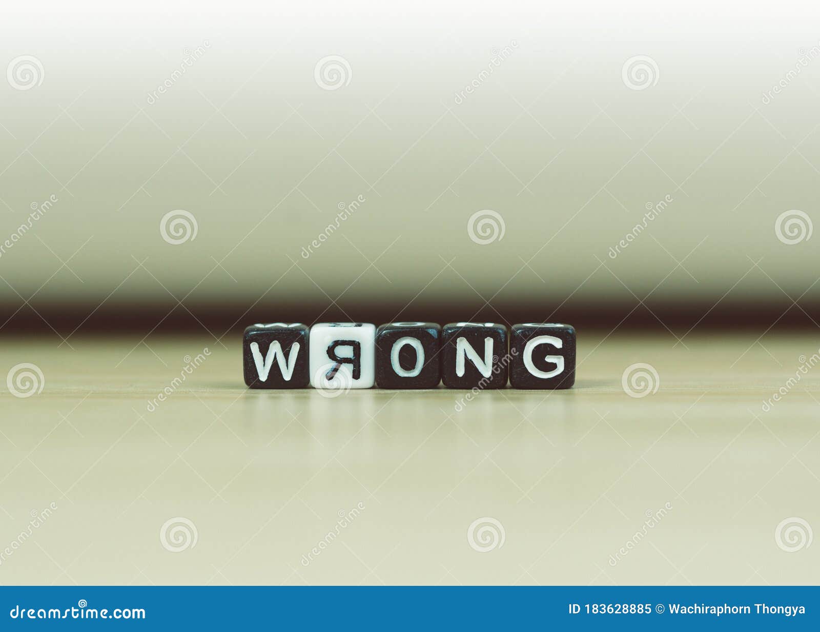 WRONG Word Written in Cube on Wooden Floor on White Background Stock ...