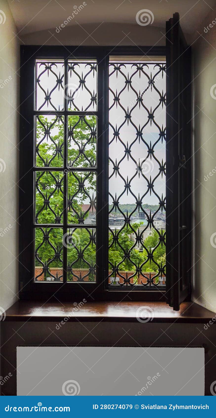 Wrought Iron Grate on the Window of the House with a Beautiful View ...