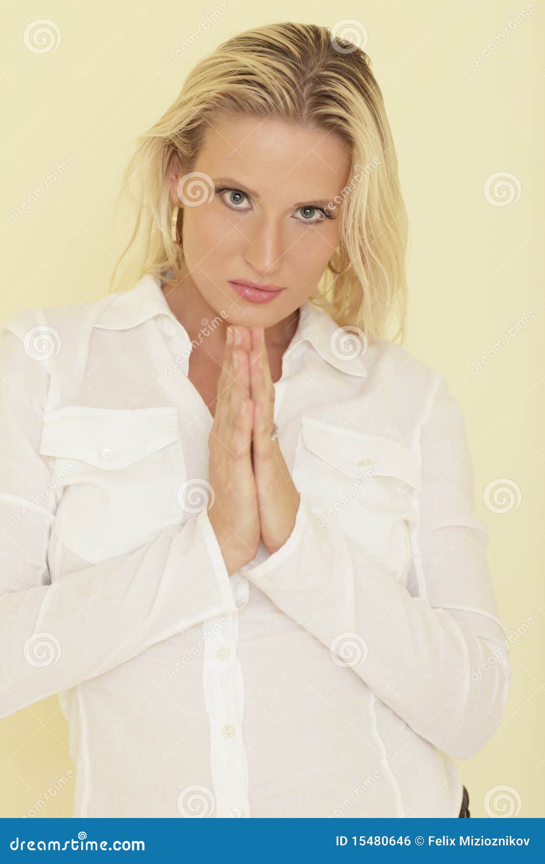 WWoman with hands clasped stock photo. Image of young - 15480646