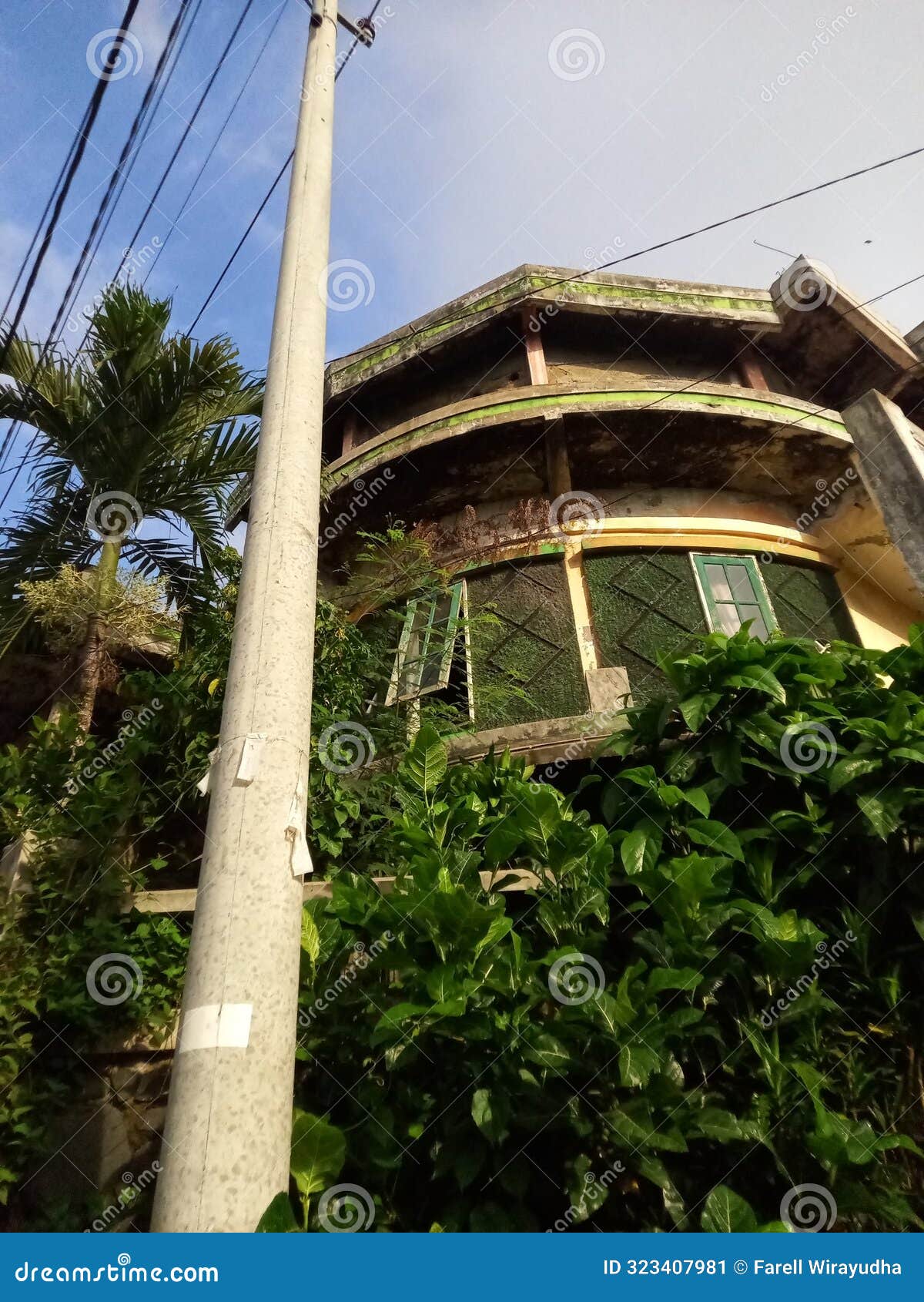 & X22;an Old House with a Single Tall Column, Standing Out in the ...