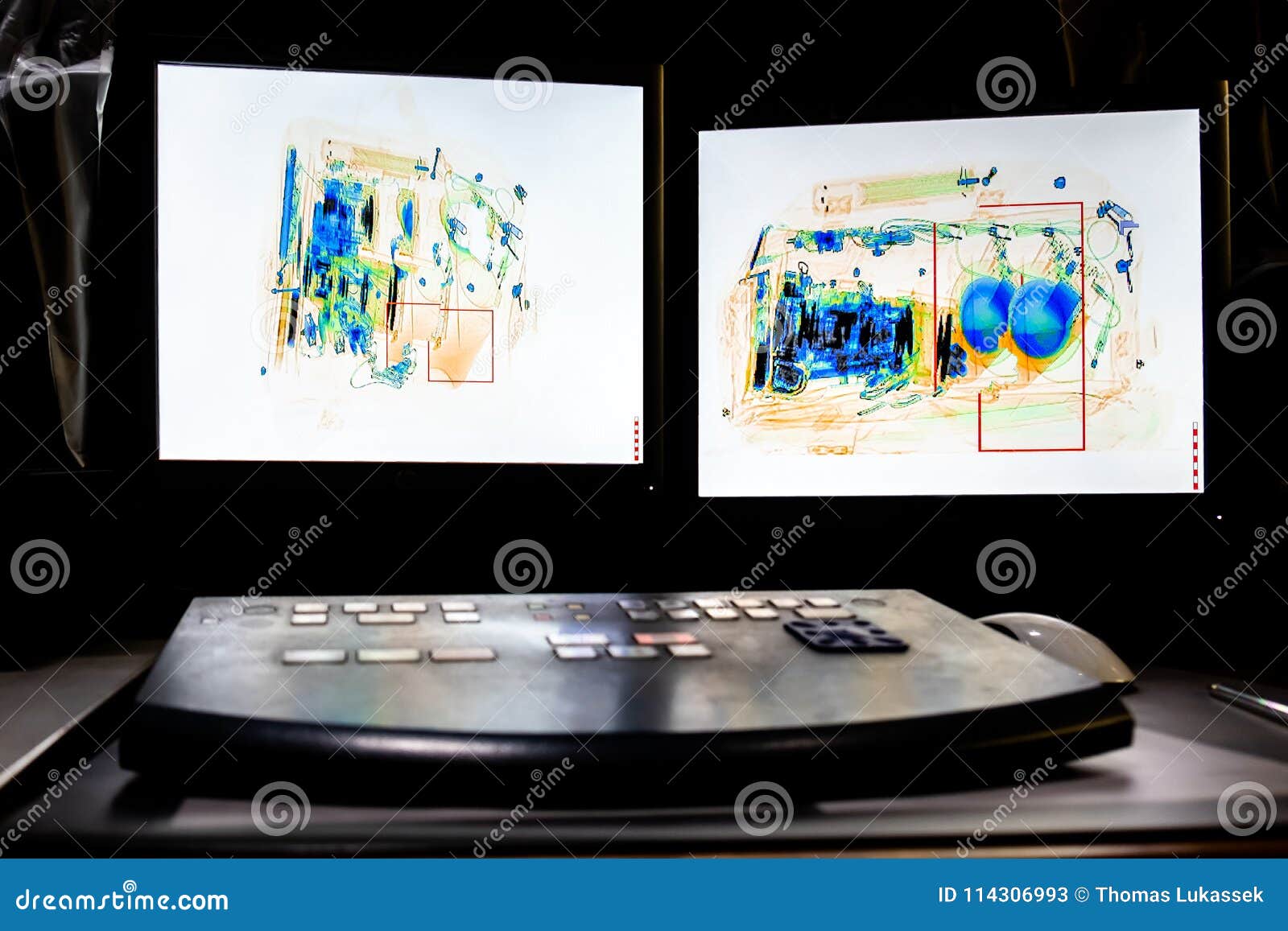 X-ray System Scanning of an Backpack Filled with Tele Zoom Camera and ...