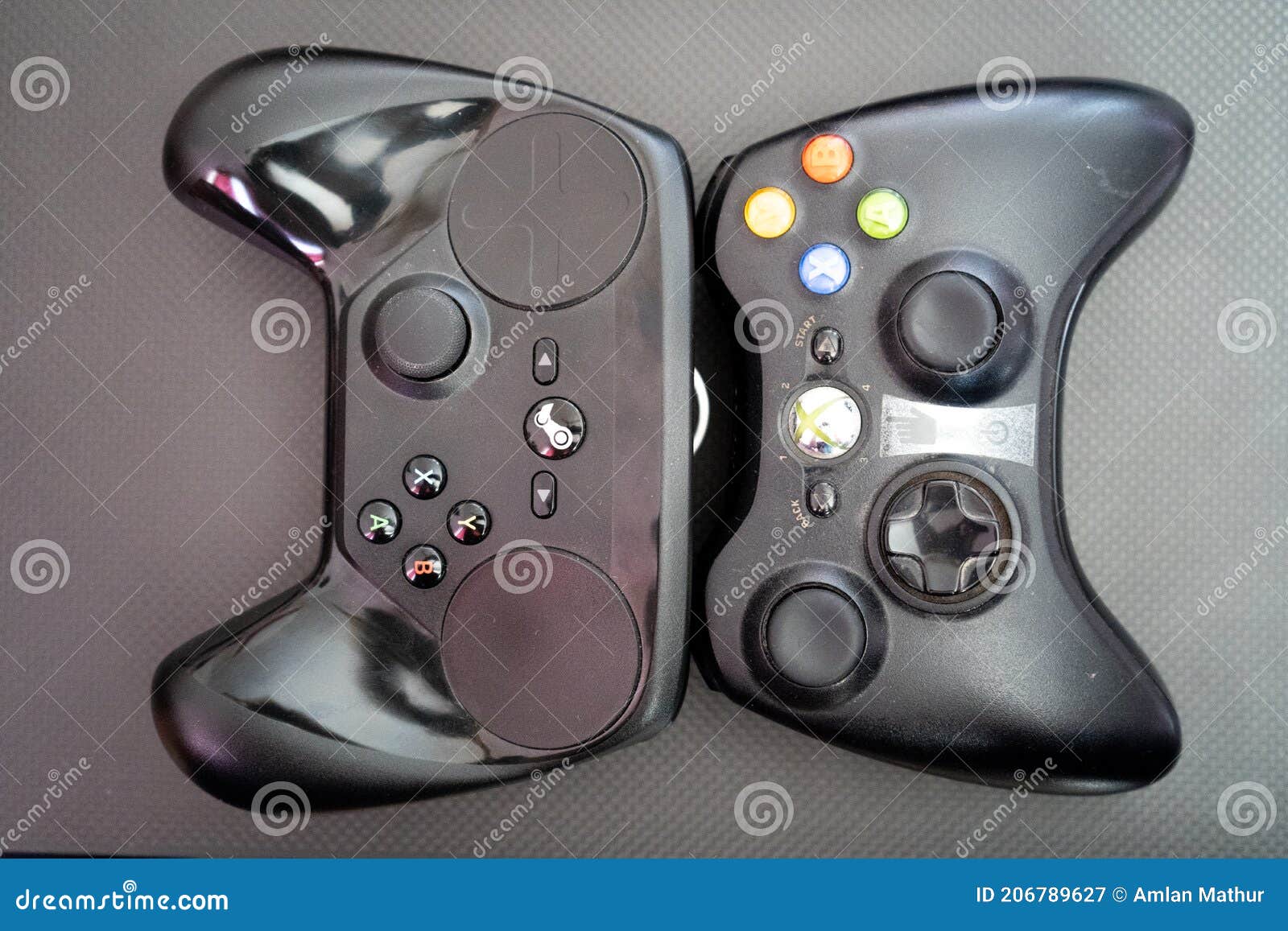 Xbox Vs the Steam Controller on a Carbon Fiber Background Showing ...