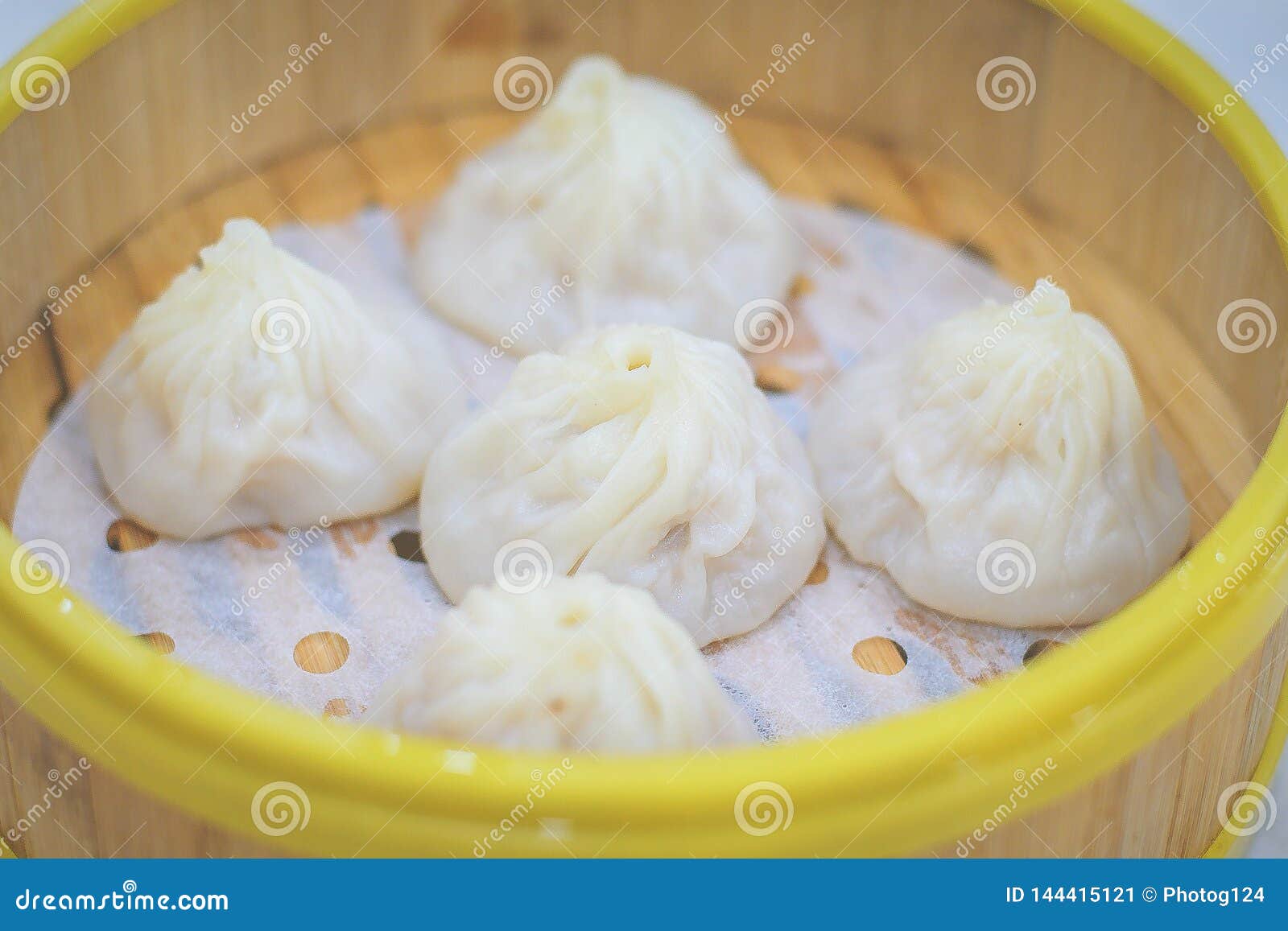 Xiao Long Bao Dumpling in Bamboo Basket with Meat and Soup Inside Stock ...