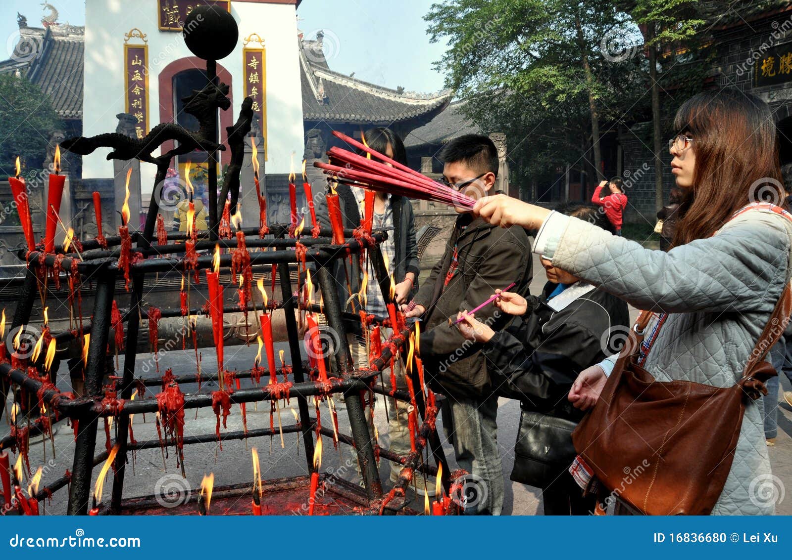 Xindu, China: Lighting Incense Sticks at Temple Editorial Image - Image ...
