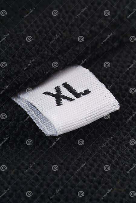 XL label stock image. Image of white, label, shirt, detail - 3245775