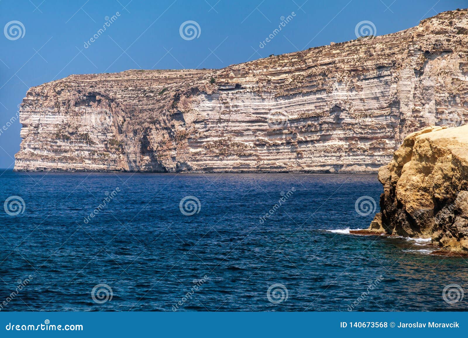 Xlendi reef at Gozo, Malta stock photo. Image of summer - 140673568