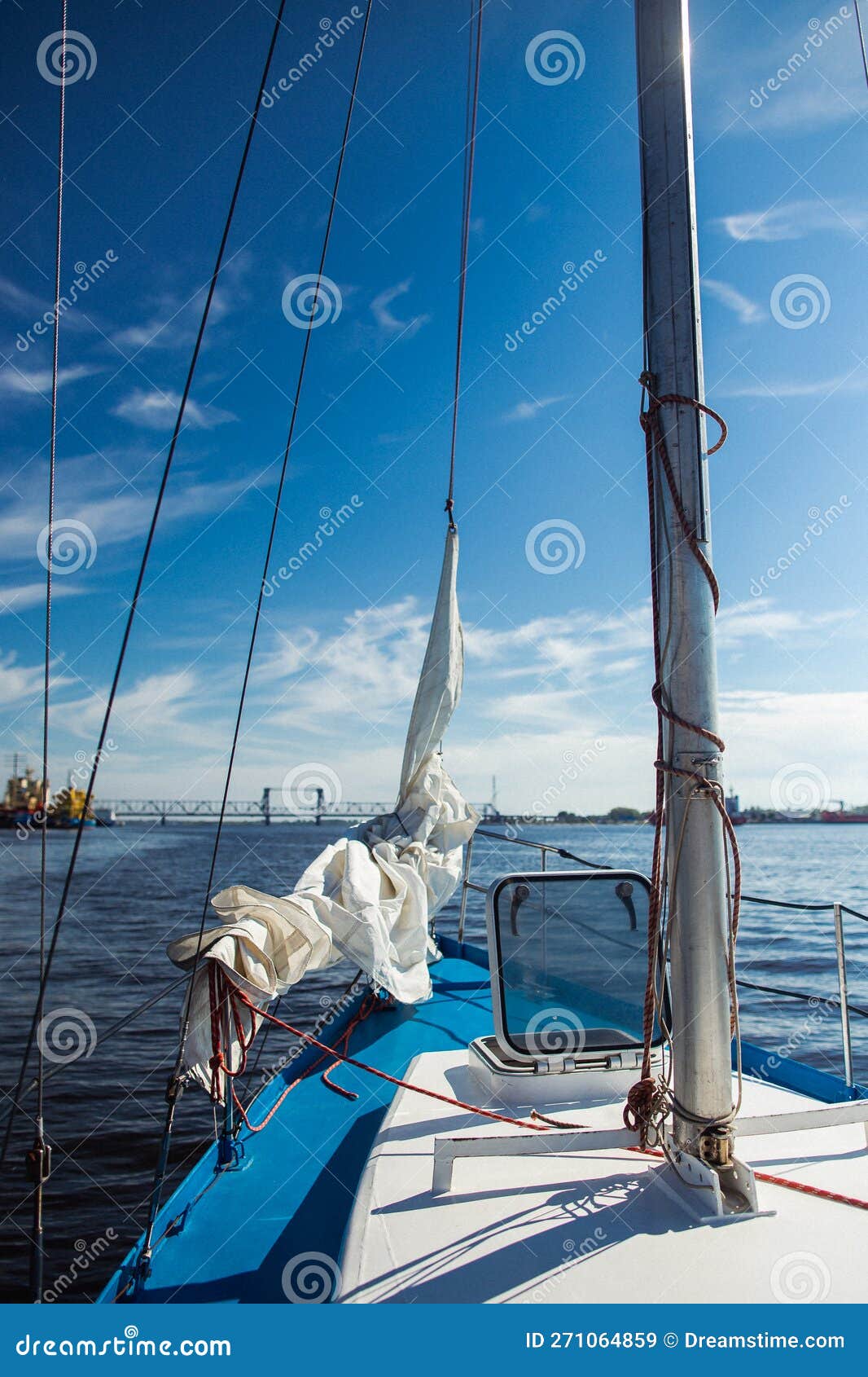 Yacht Mast with Folded Sail and Blue Water Stock Image - Image of blue ...