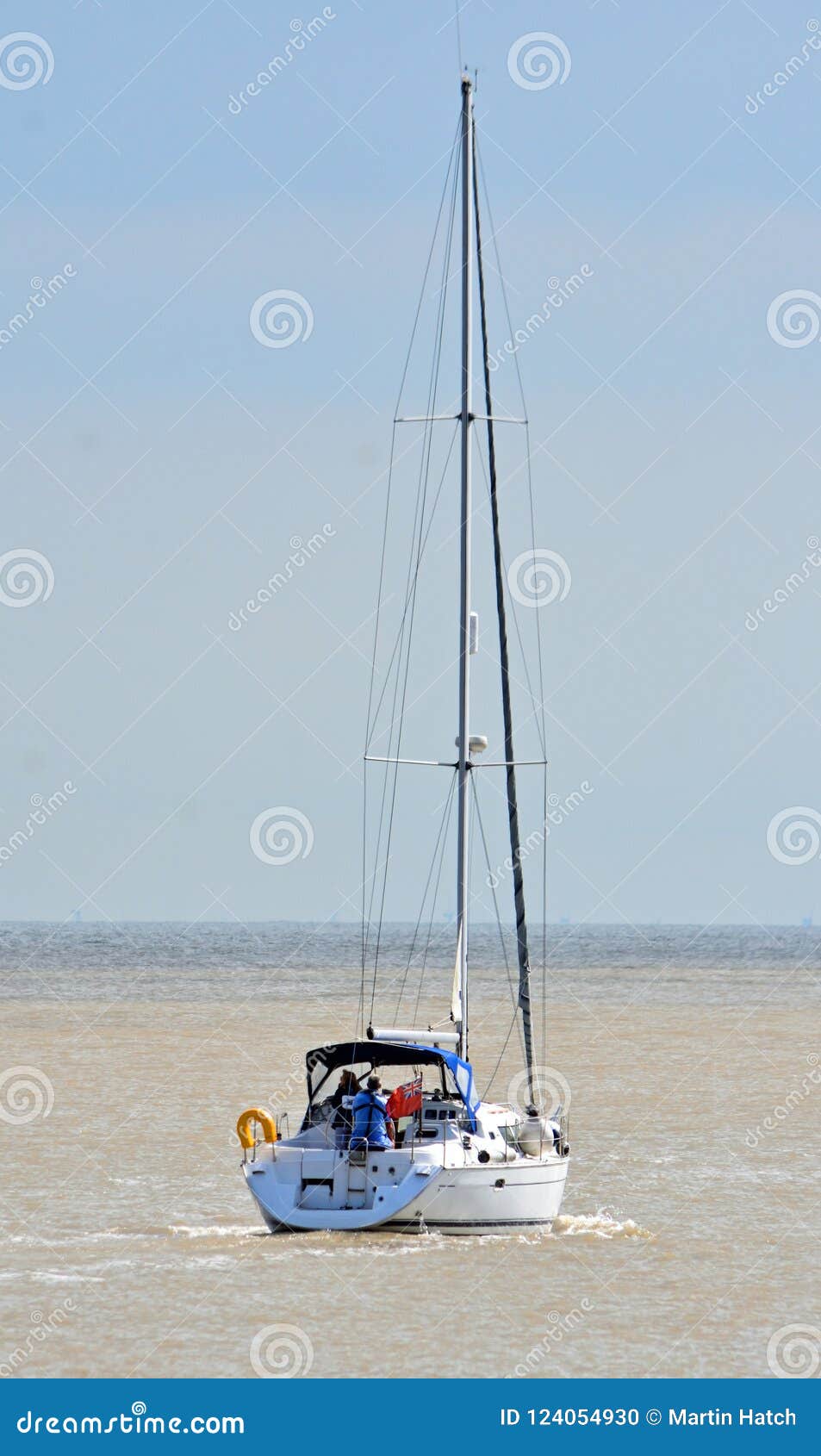 Yacht on the Ocean with Sail Down Vertical Format Stock Photo - Image ...