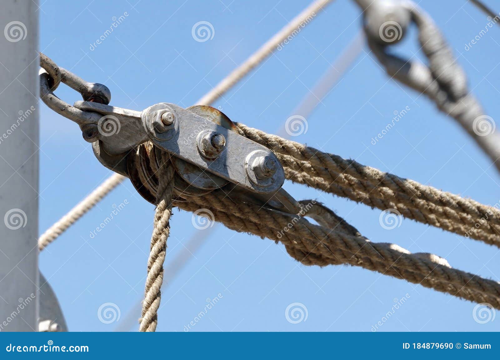 Rope on block stock photo. Image of closeup, sport, metal - 184879690