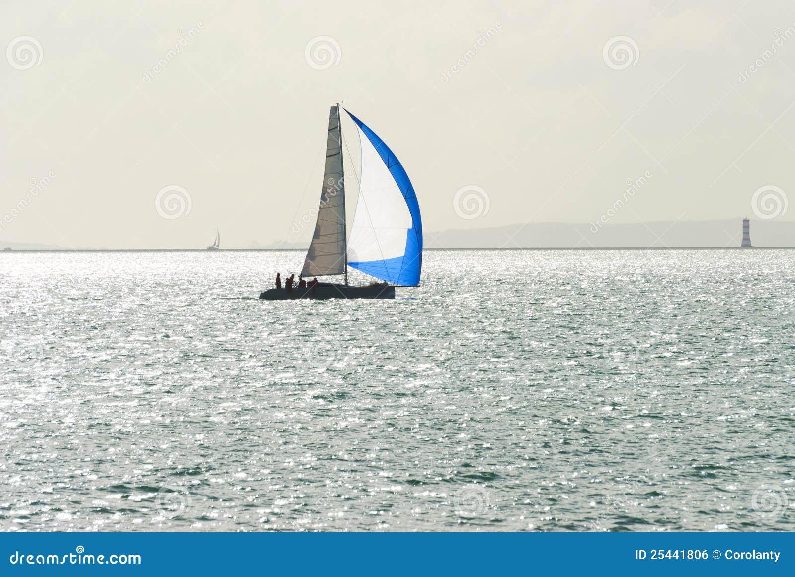 Yacht Sailing with Blue and White Spinnaker Stock Photo - Image of ...