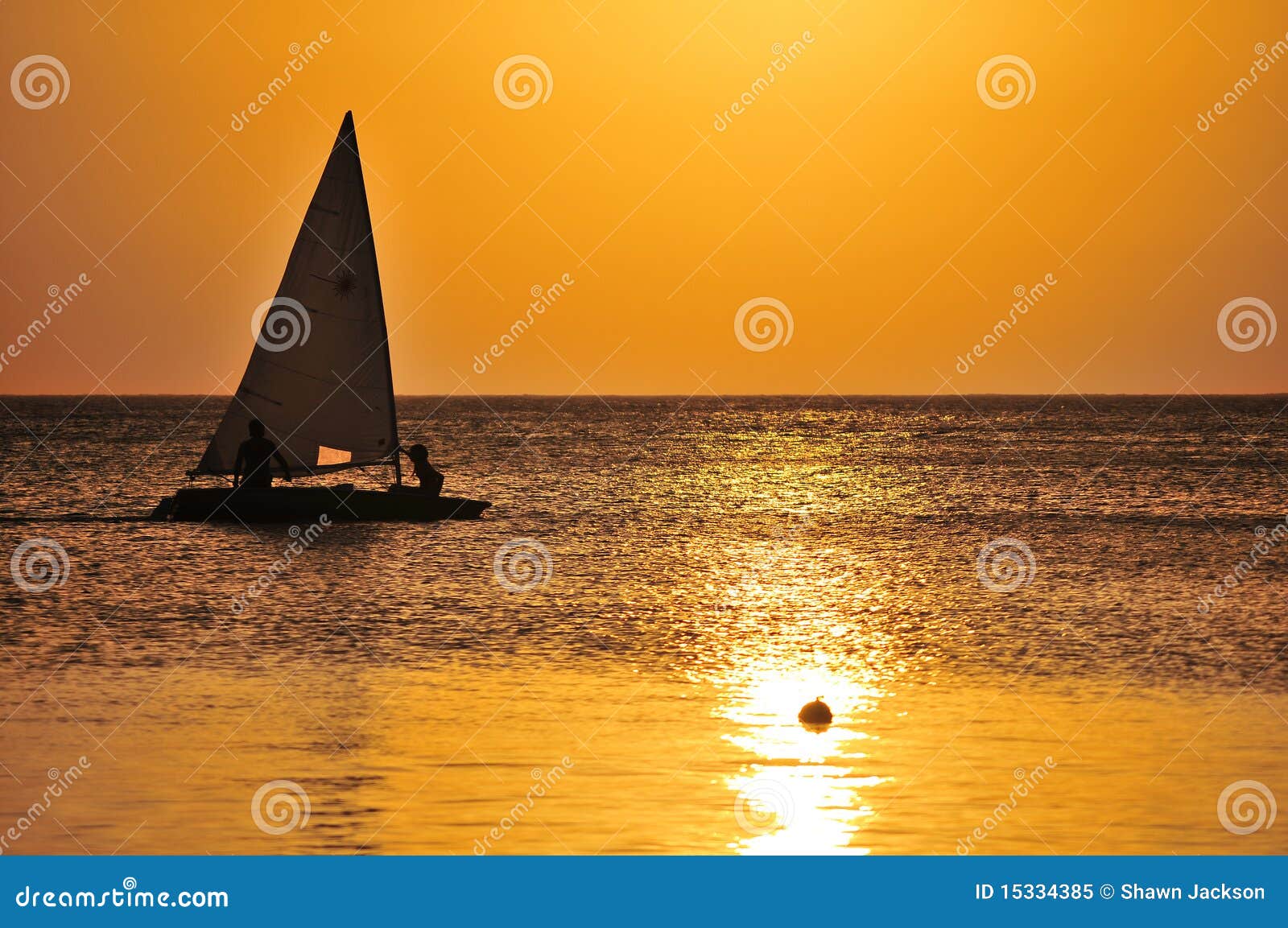 Yacht sailing at sunset stock image. Image of scenery - 15334385