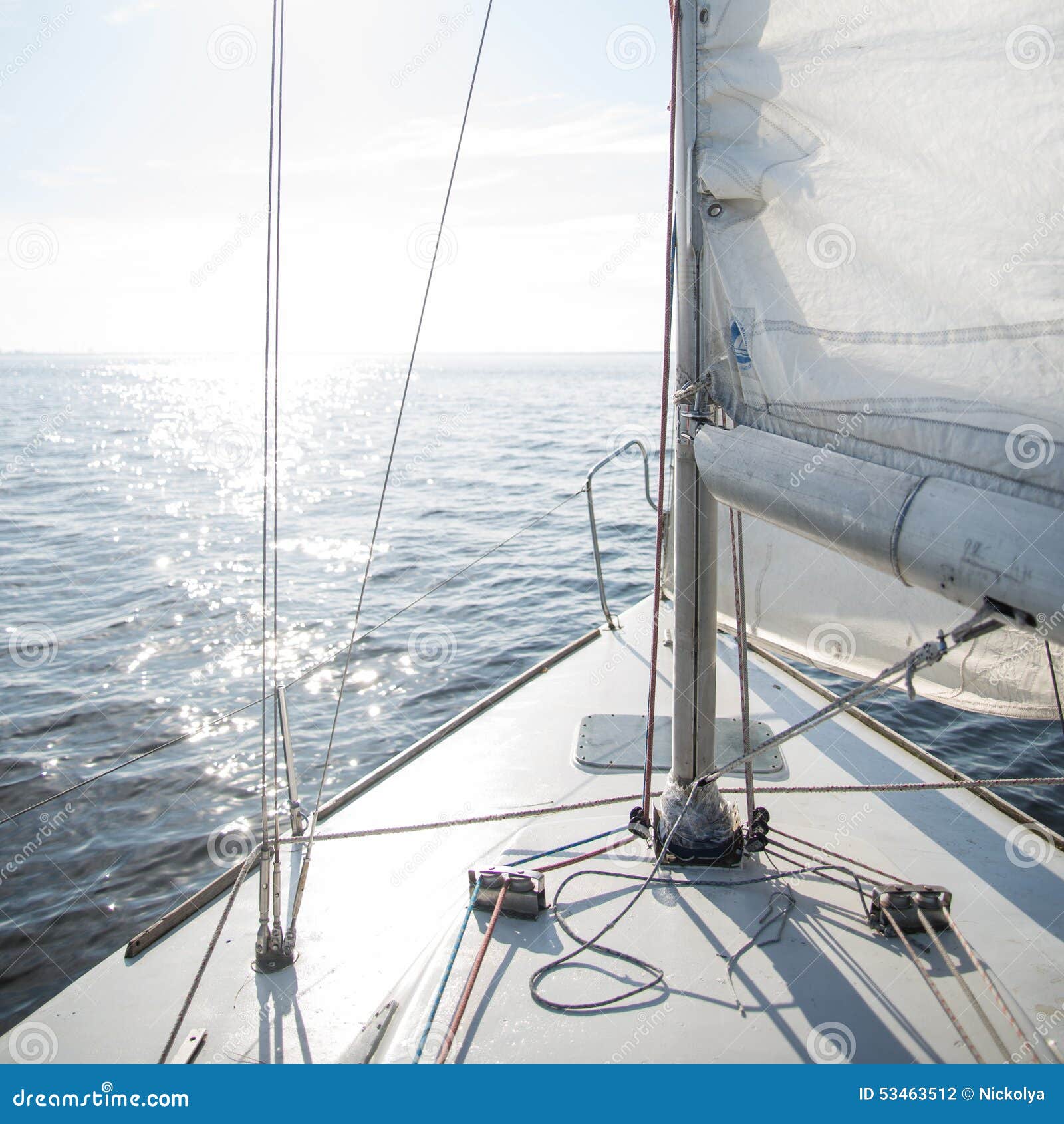 Yacht Sailing Towards the Sunset Stock Photo - Image of nautical ...