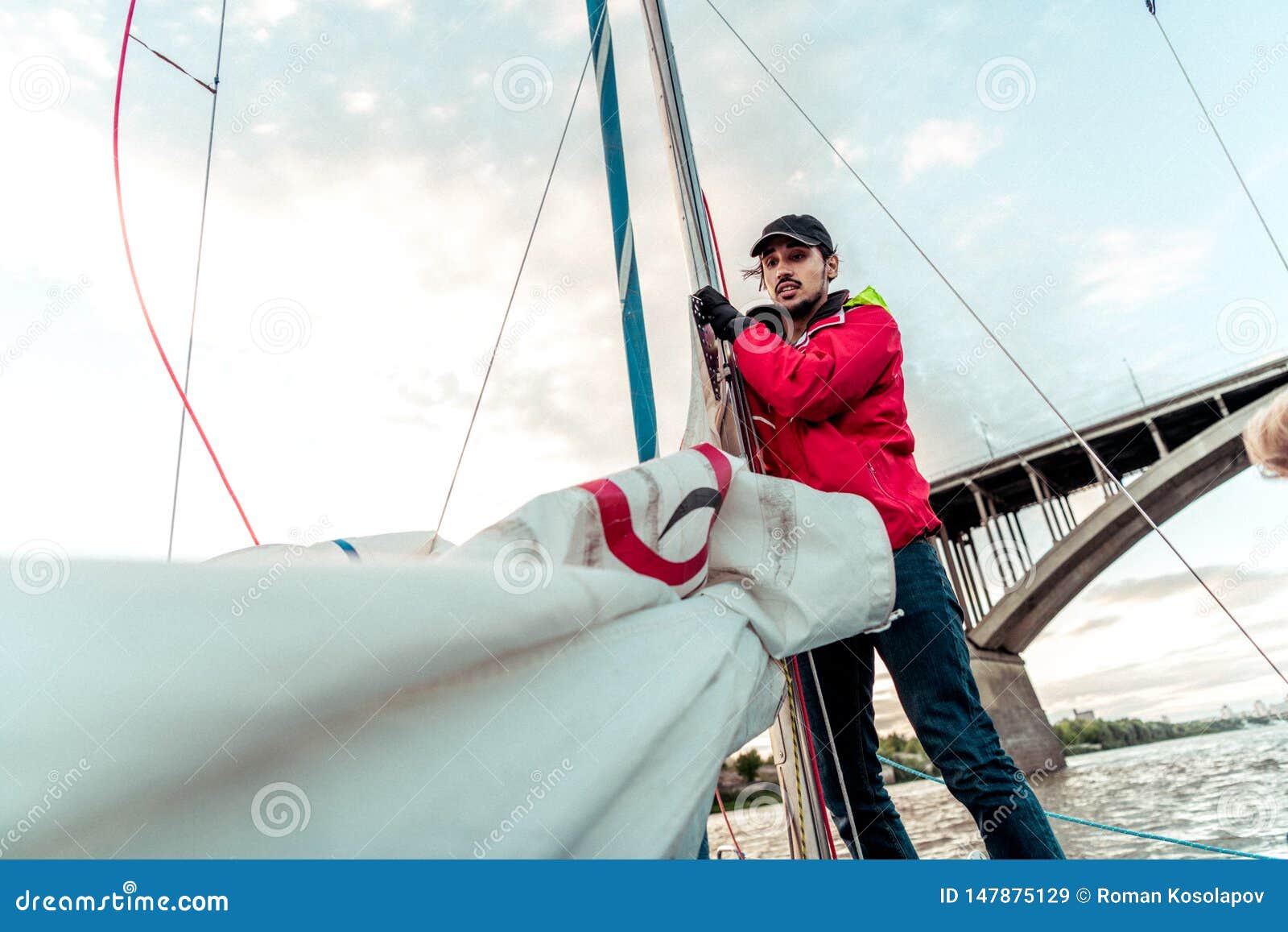 Yacht Sailor Pulling Rope. Man Working on Sailboat. Stock Image - Image ...
