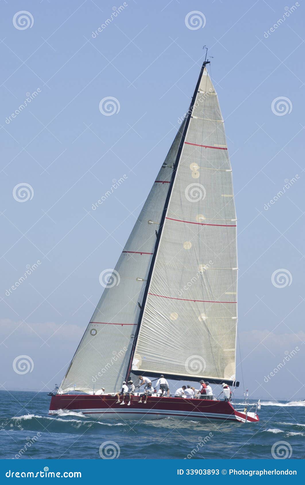 Yacht with White Sail Competes in Team Sailing Event Stock Image ...