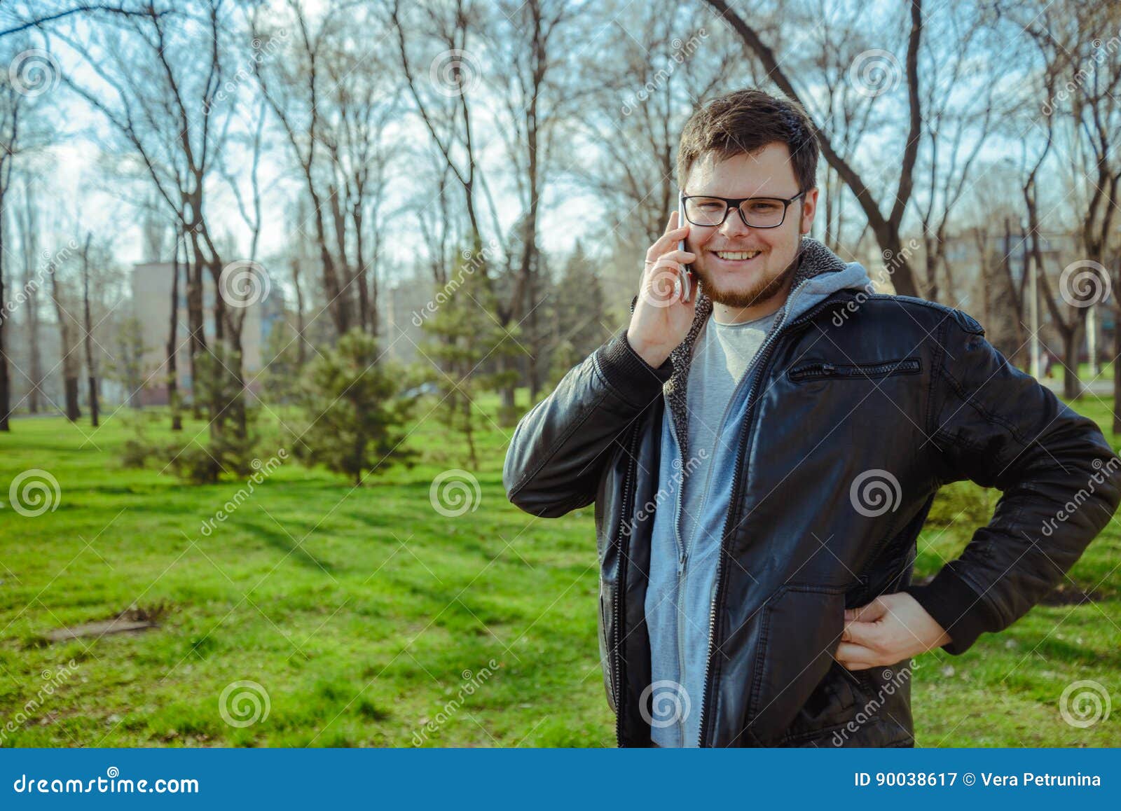 Yang Man with Smartphone in the Park Stock Image - Image of male, adult ...