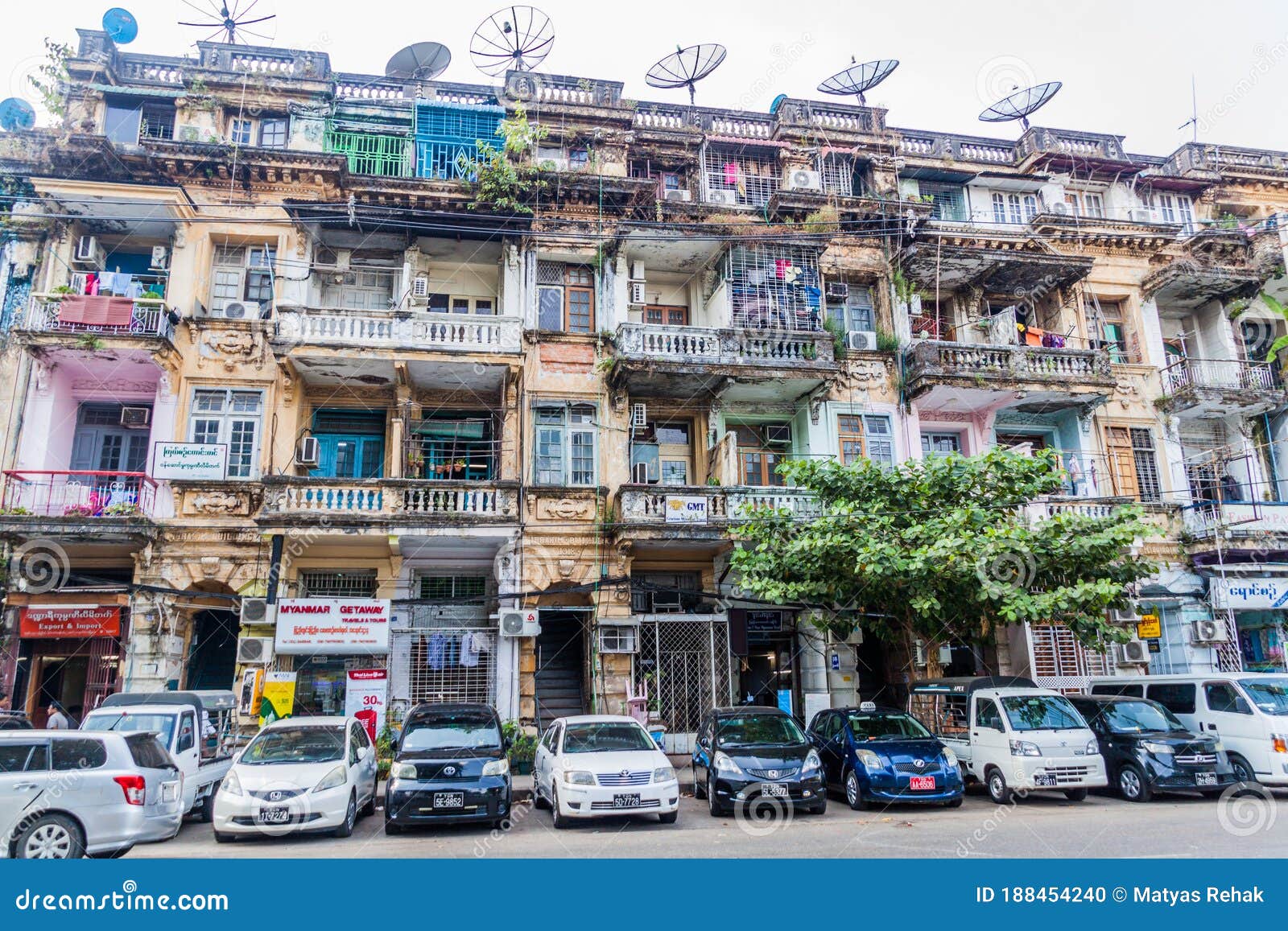 YANGON, MYANMAR - DECEMBER 15, 2016: Old Dilapidated Buildings in Yango ...