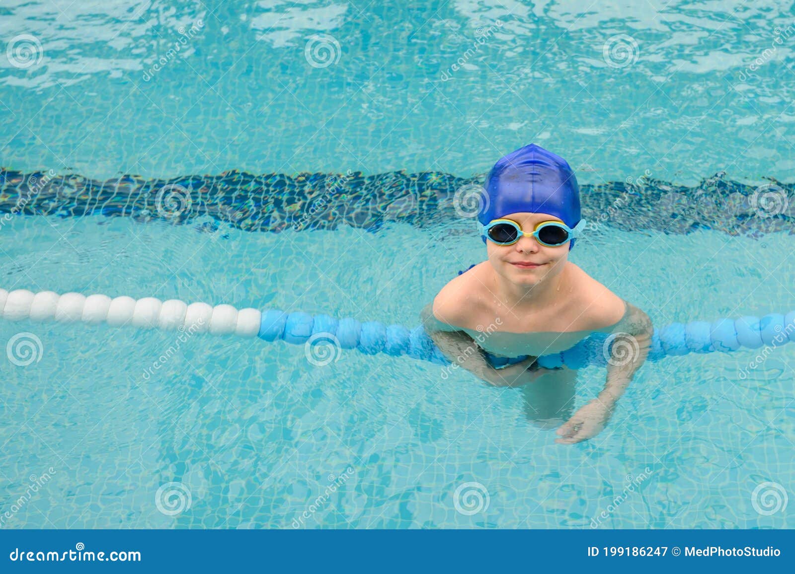 A 7-year Boy Swimming Backstroke in a Swimming Pool Stock Image - Image ...