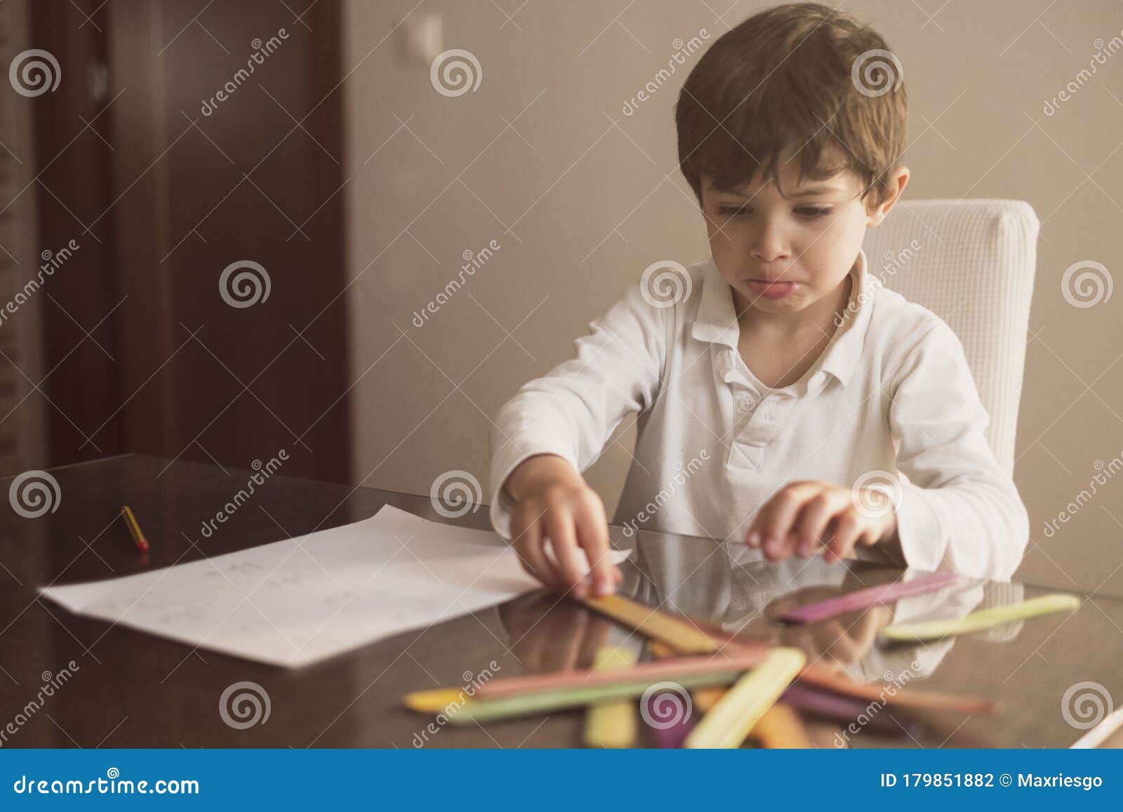 4-year-old Boy Does Homework at Home.he Does Addition and Subtraction ...