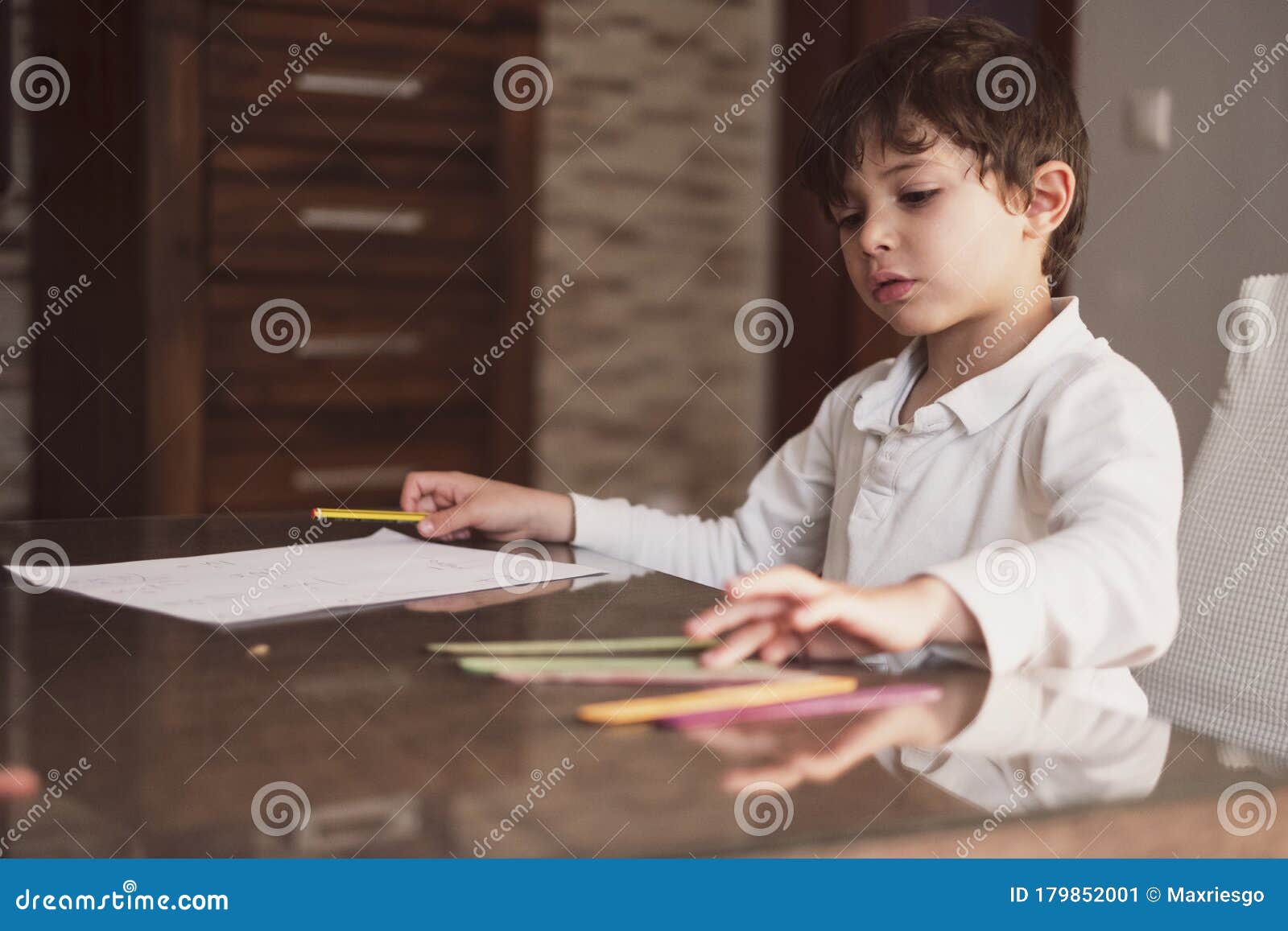 4-year-old Boy Does Homework at Home.he Does Addition and Subtraction ... 4-year-old Boy Does Homework at Home.he Does Addition and Subtraction ...