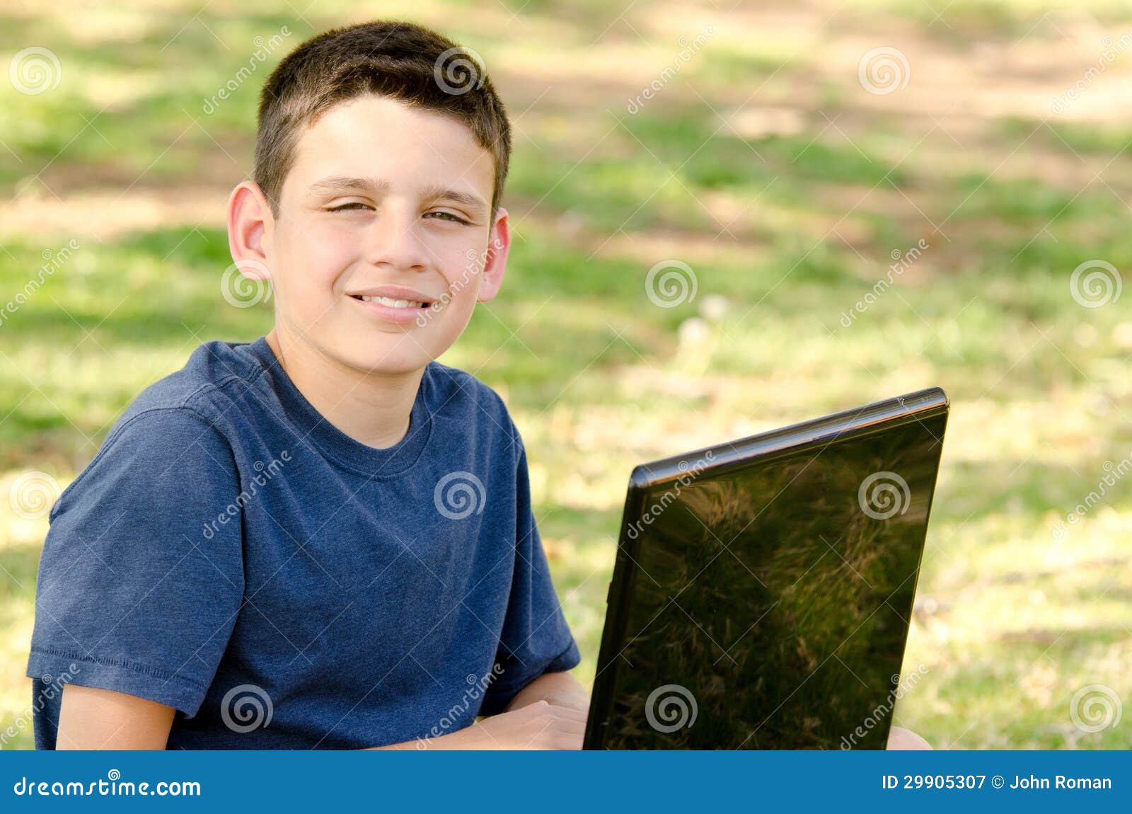 Child with computer stock image. Image of shirt, plaid - 29905307