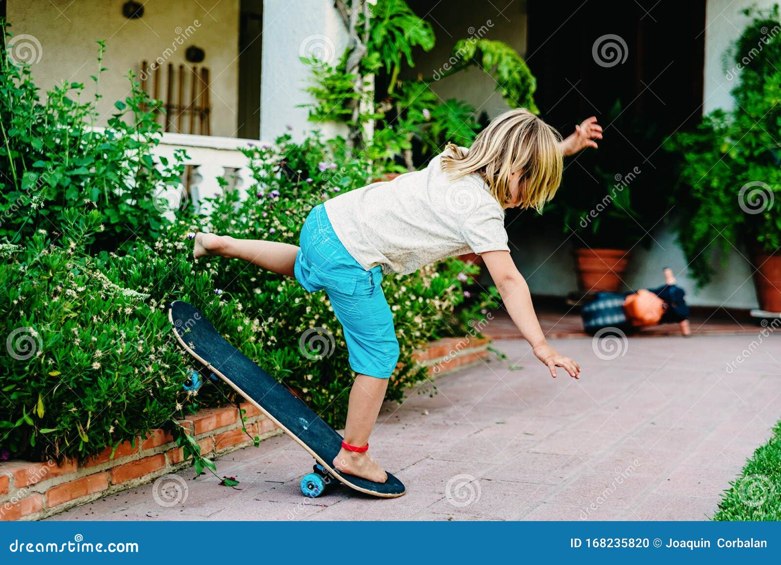 5 Year Old Boy Practicing Skate in His Backyard, Stumbling and Falling ...