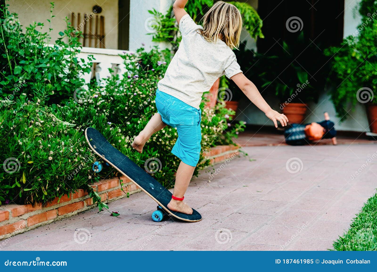 5 Year Old Boy Practicing Skate in His Backyard, Stumbling and Falling ...