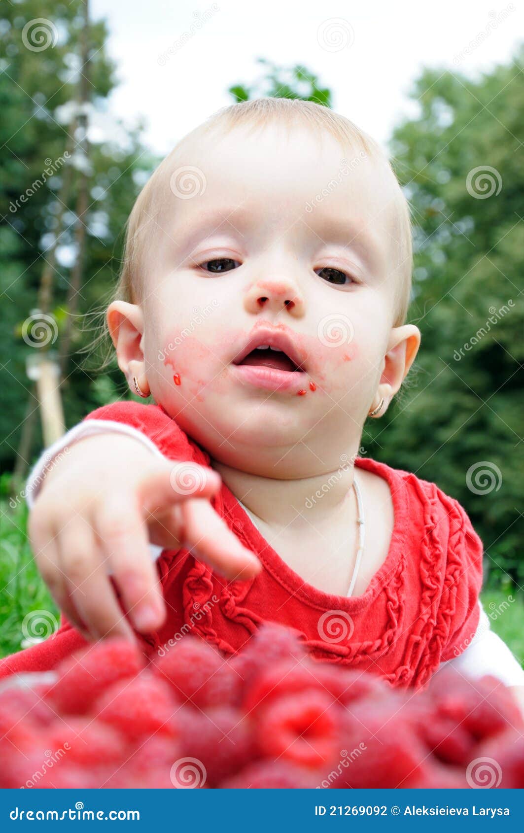 Year-old Girl Eating Raspberries Stock Photo - Image of green ...
