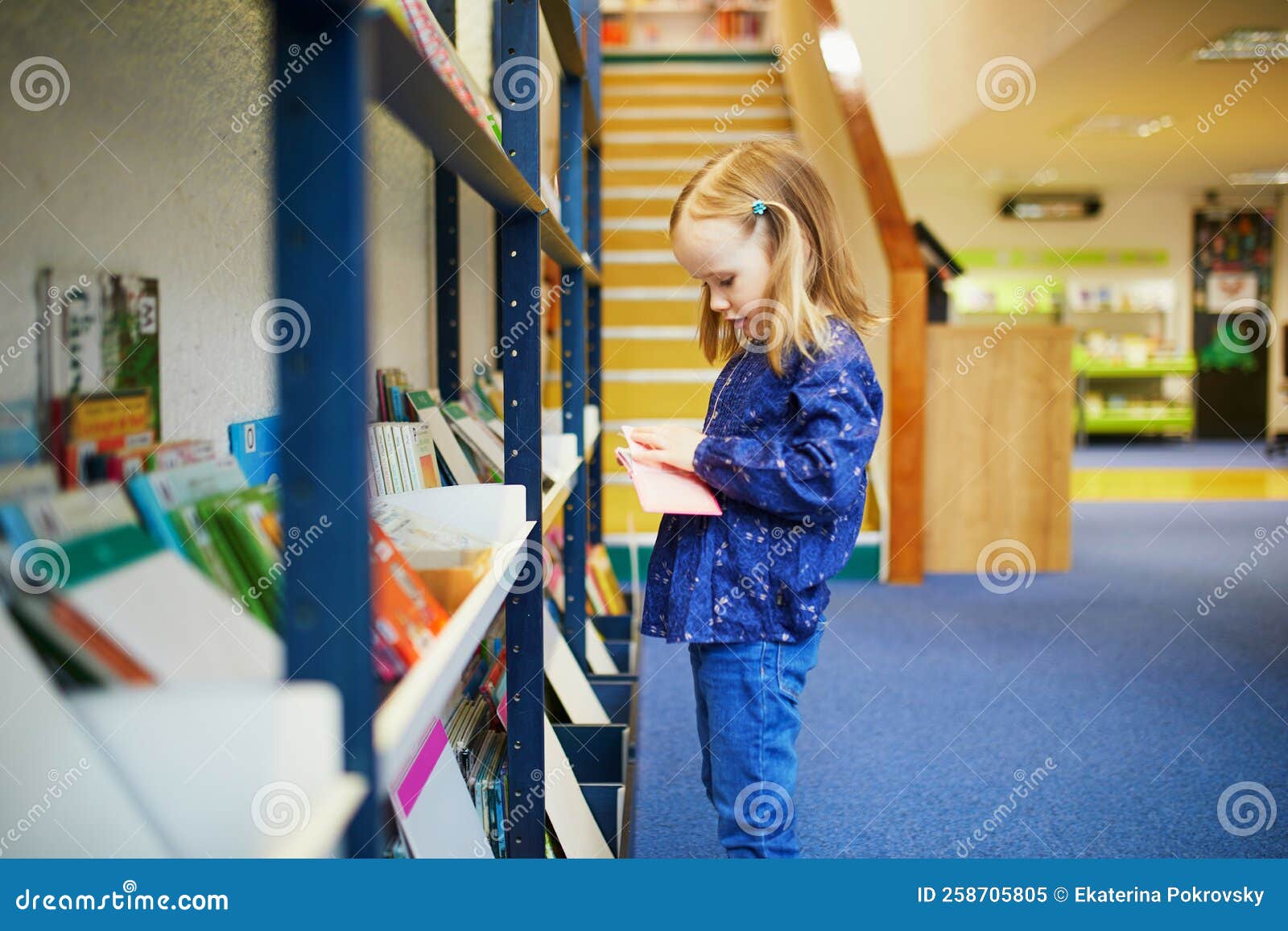 4 Year Old Girl Selecting a Book in Municipal Library Stock Image ... 4 Year Old Girl Selecting a Book in Municipal Library Stock Image ...