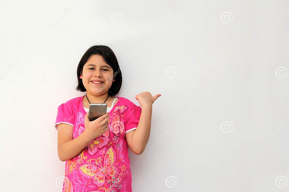 10 Year Old Hispanic Girl Uses Her Cell Phone To Make Video Calls Play