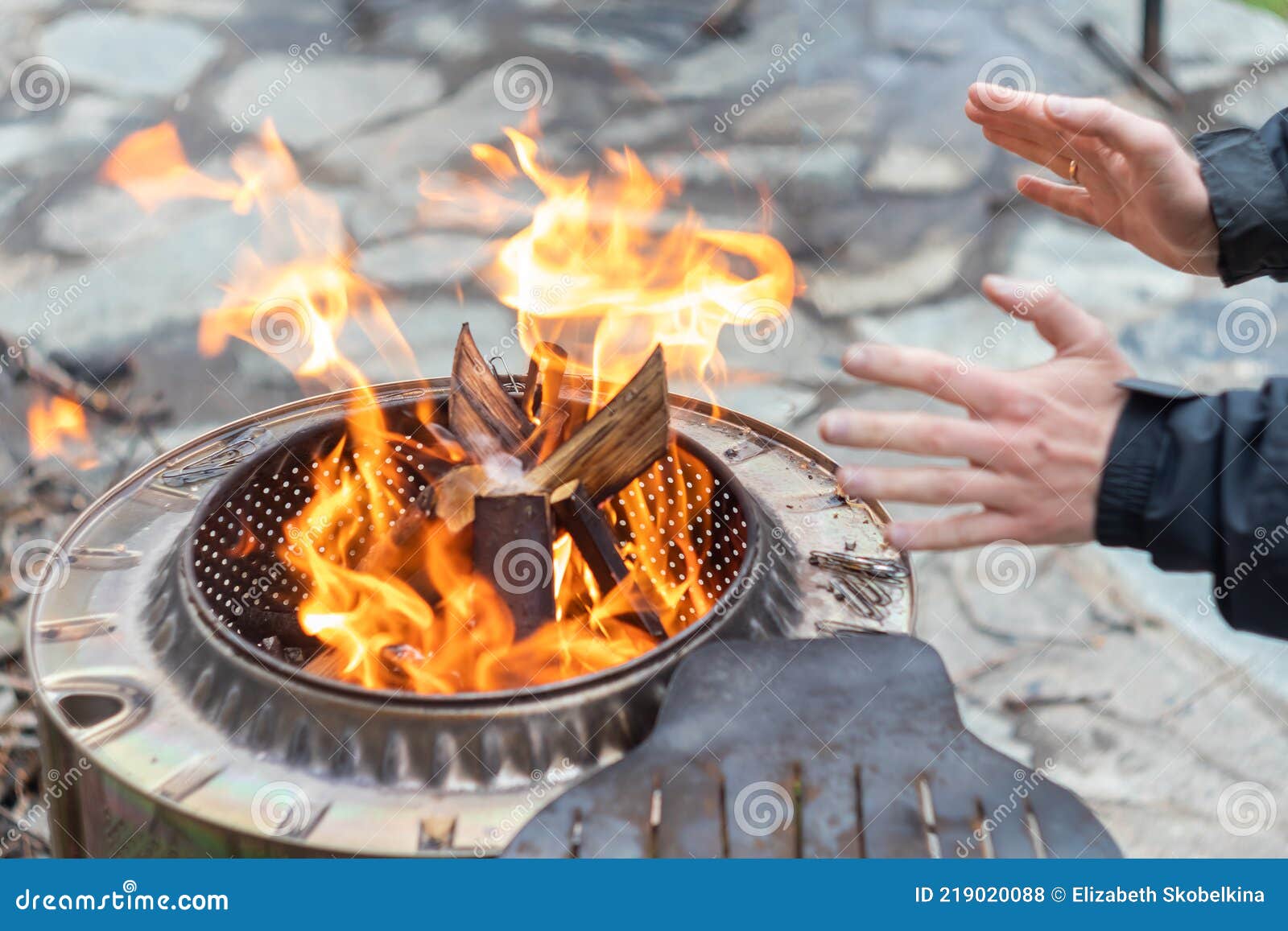 30-year-old Man Warms His Hands by the Fire Stock Photo - Image of ...