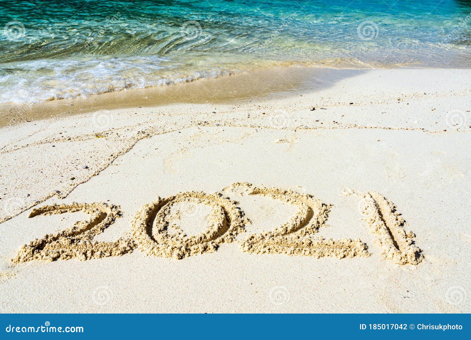 The year 2021 in the sand stock photo. Image of 2021 - 185017042