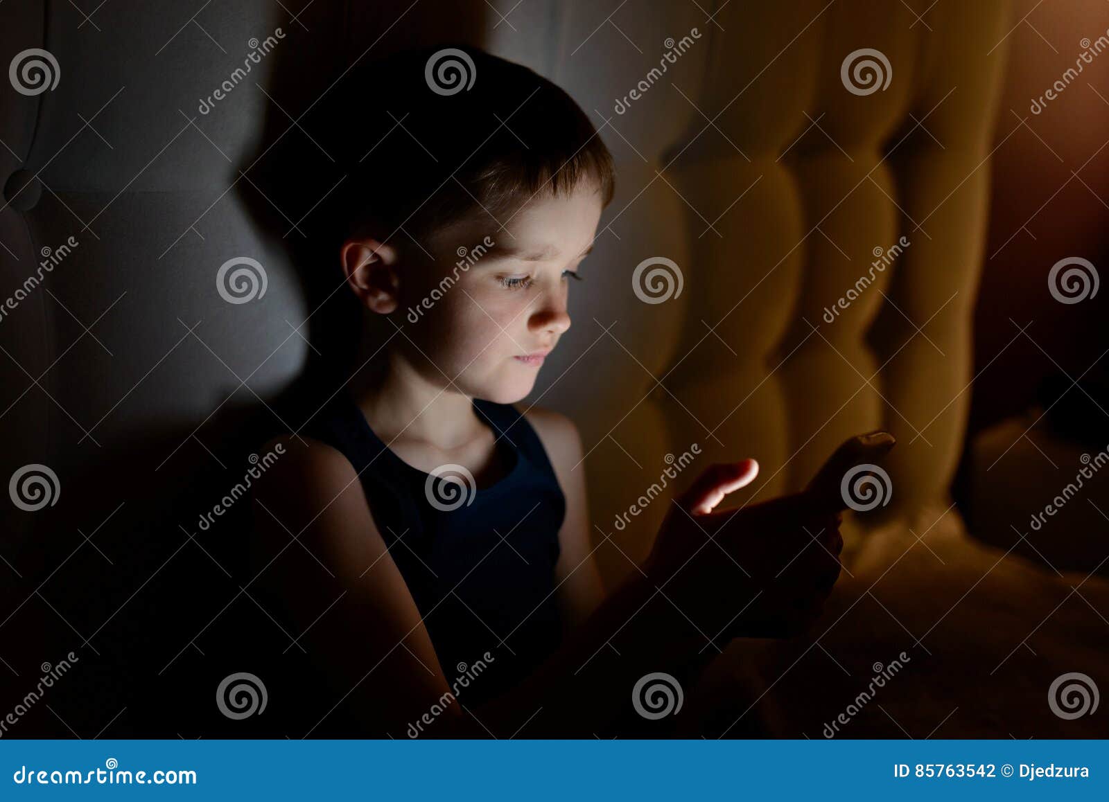 7 Years Old Child Boy Using Smartphone at Night Stock Photo - Image of ...