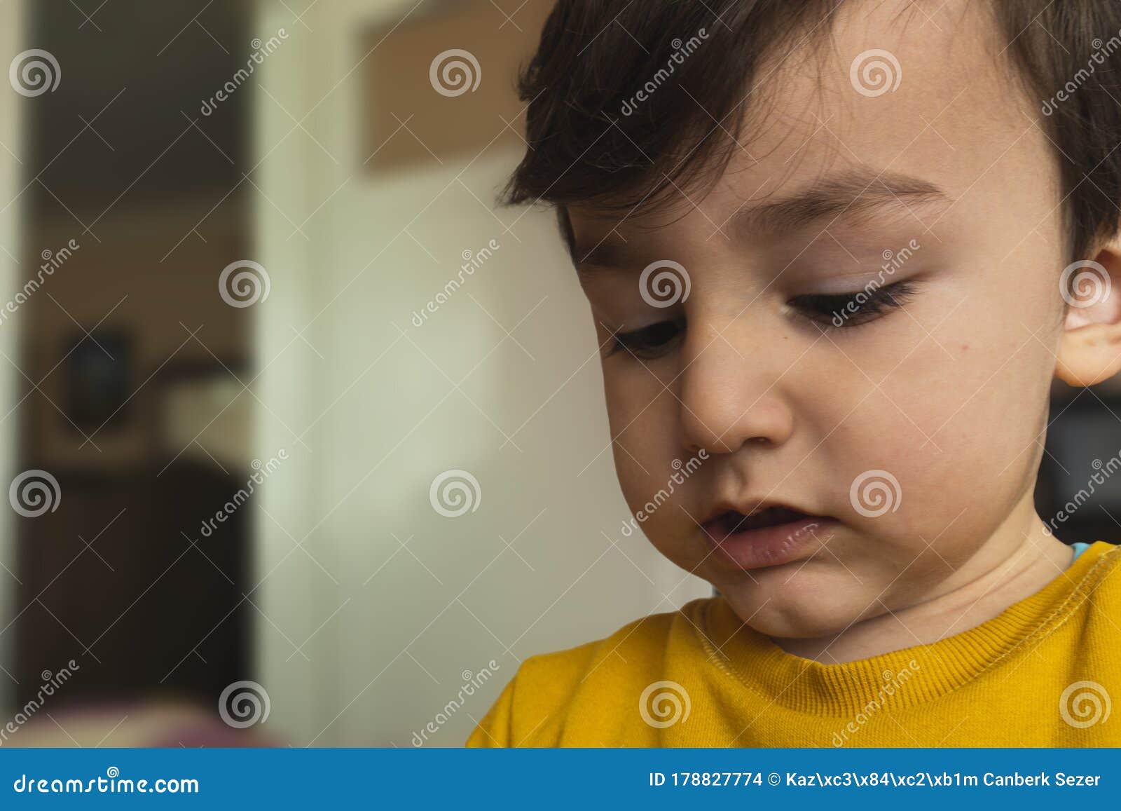 3 Years Old Cute Turkish Baby Staring Down Stock Photo - Image of ...