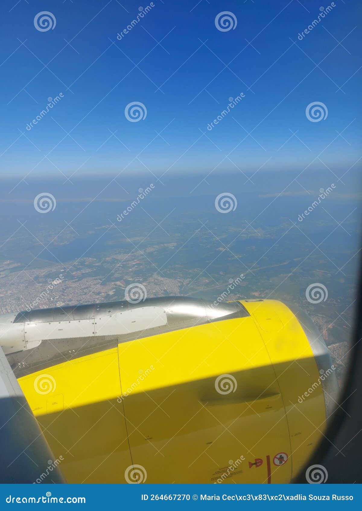 Yellow Airplane on the Sky... Big City Stock Photo - Image of airplane ...