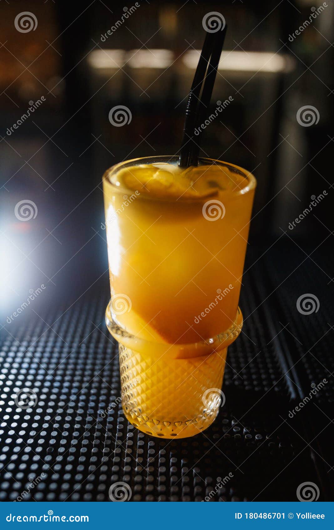 Yellow alcohol cocktail stock image. Image of focus - 180486701
