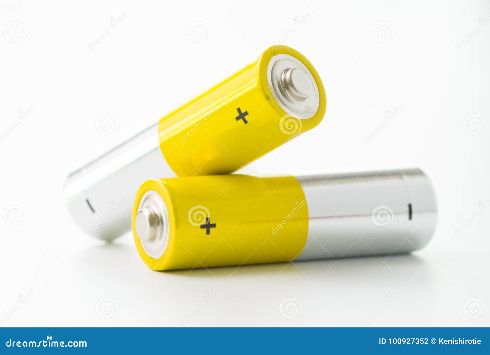 Yellow alkaline batteries stock photo. Image of minus - 100927352