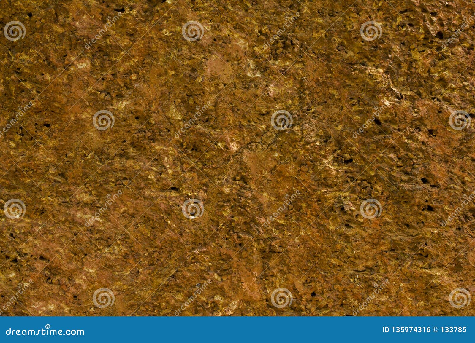 A Yellow Amber Smooth Stone Wall. Rough Natural Texture Surface Stock ...
