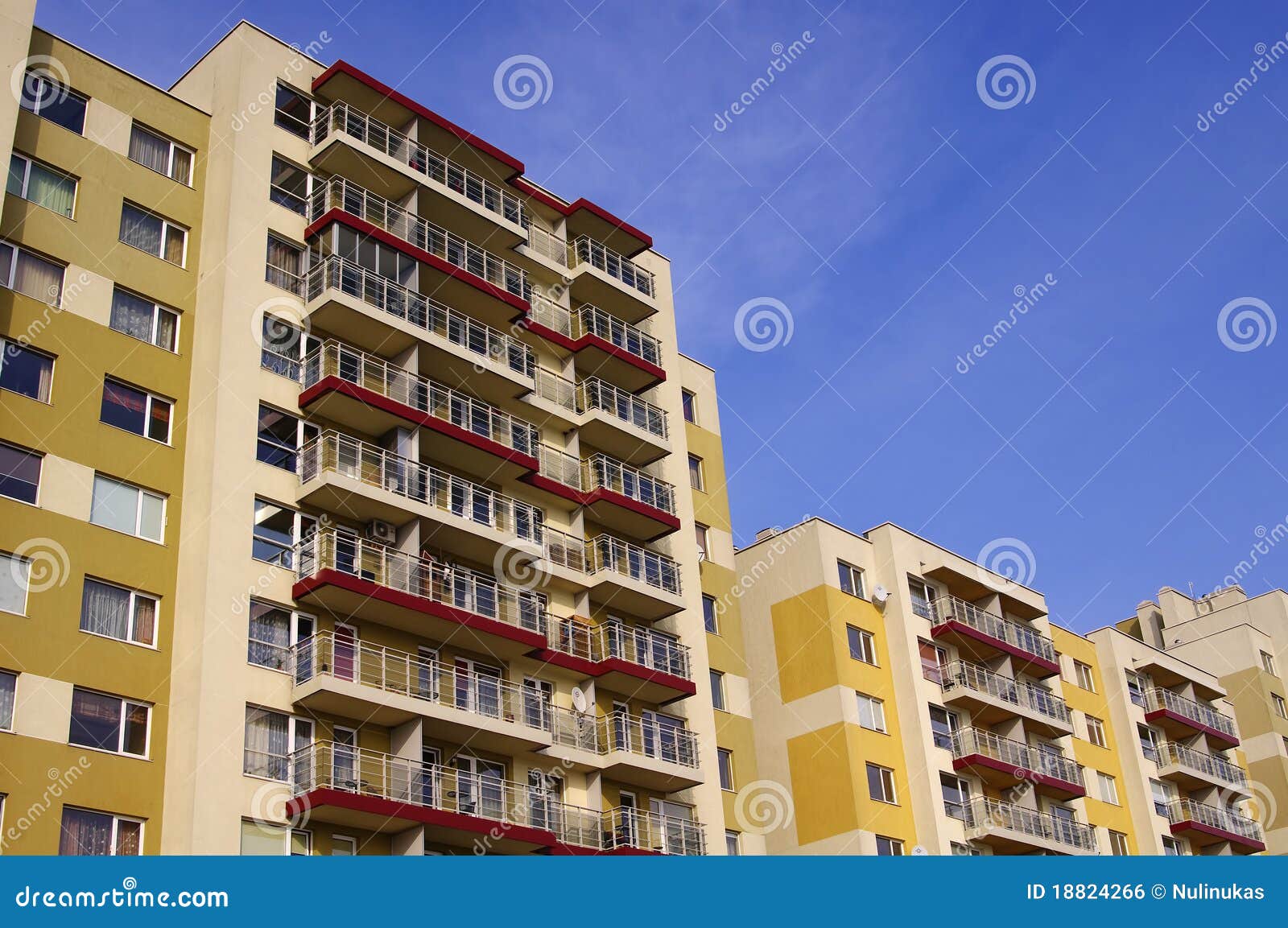 Yellow apartment buildings stock photo. Image of business - 18824266