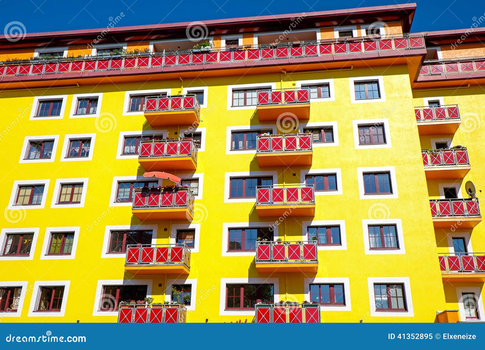 Yellow apartment house stock image. Image of balcony - 41352895