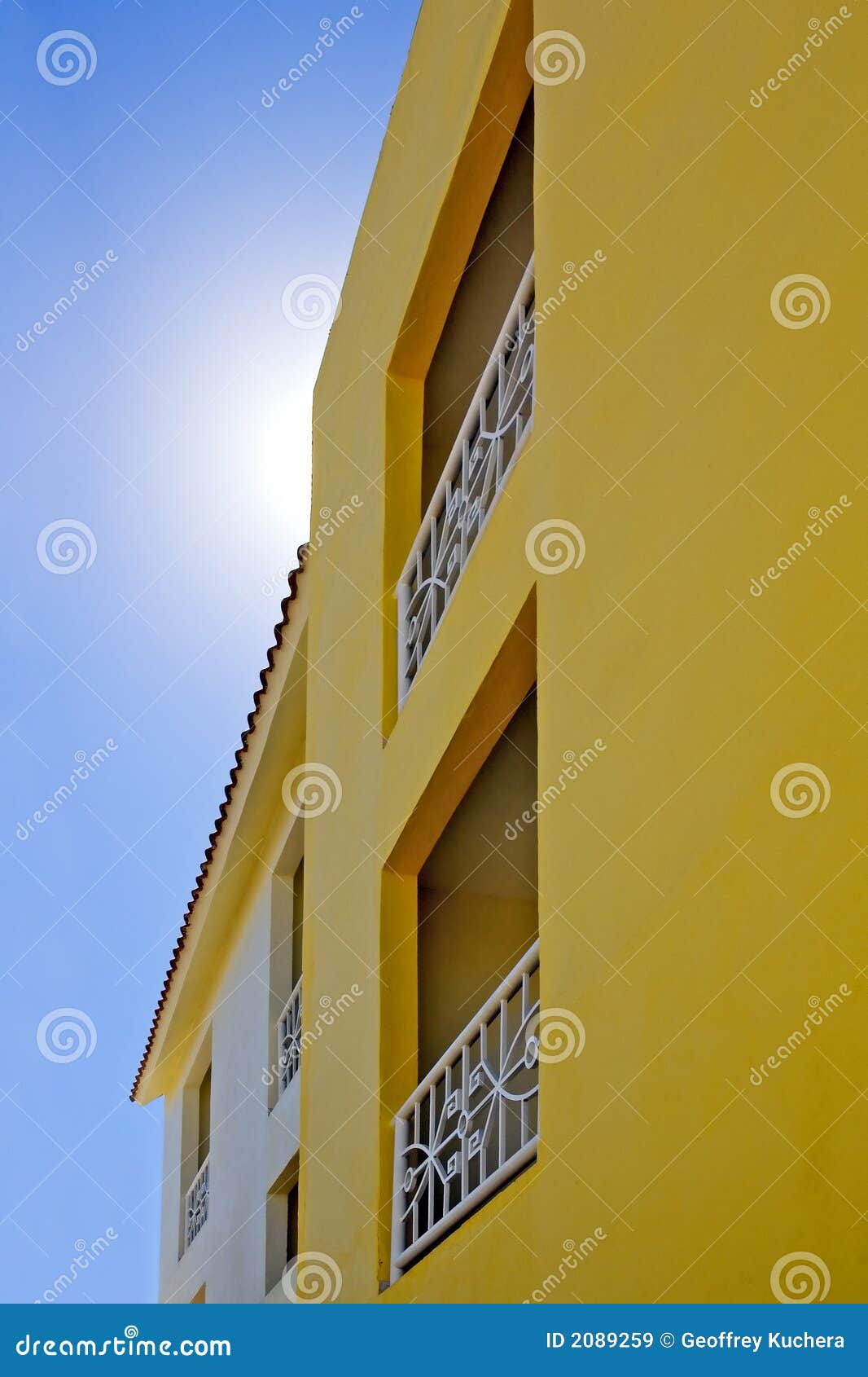 Yellow Apartments and Blue Sky Stock Image - Image of exterior ...