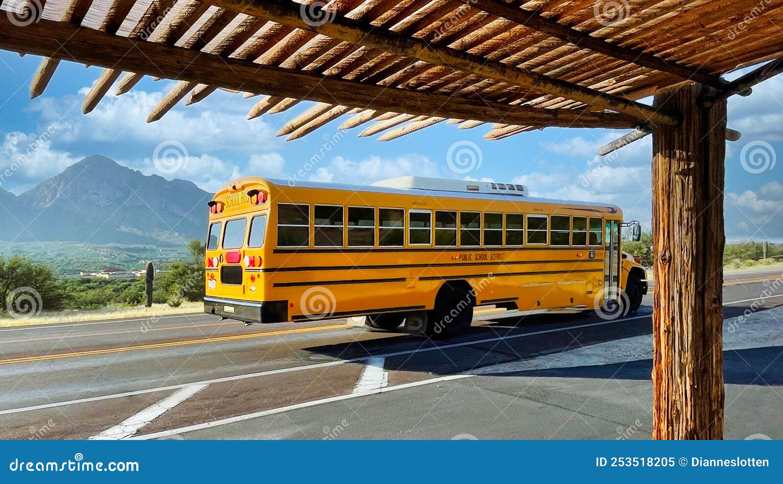 Yellow Arizona School Bus Stop Ramada with Mountain Backdrop Stock ...
