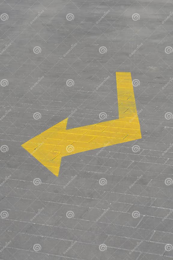 Yellow arrow stock photo. Image of direction, indicator - 308801530