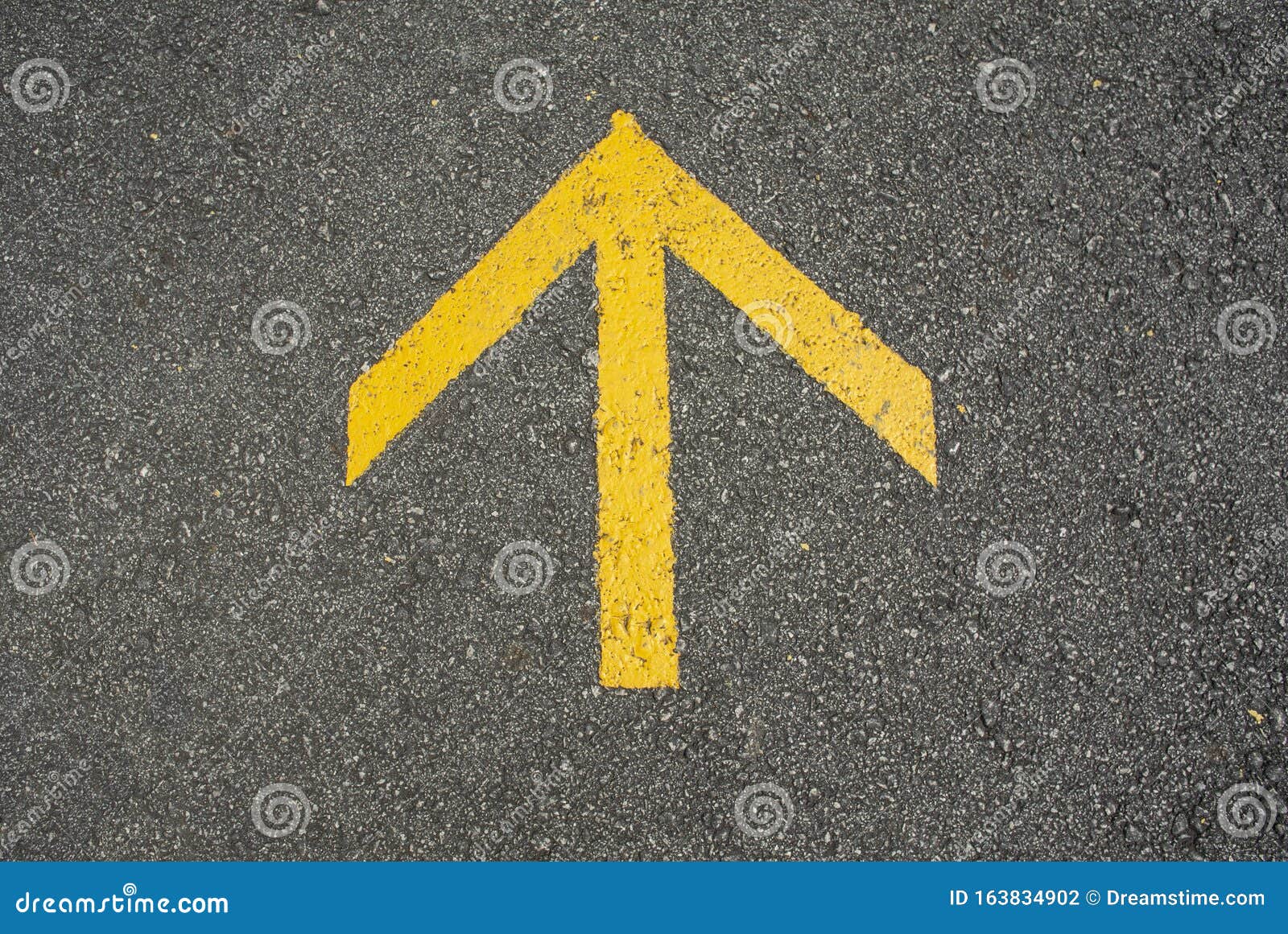 Yellow Arrow Sign Painted on Asphalt or Road Stock Photo - Image of ...