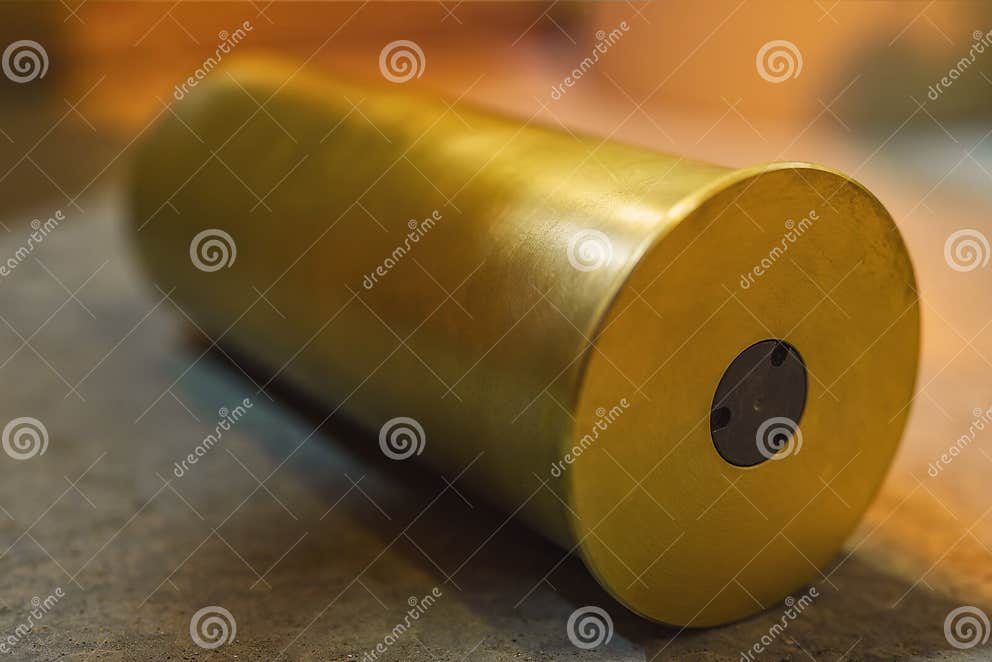 Yellow Artillery Shell Casing Close-up Stock Image - Image of copper ...